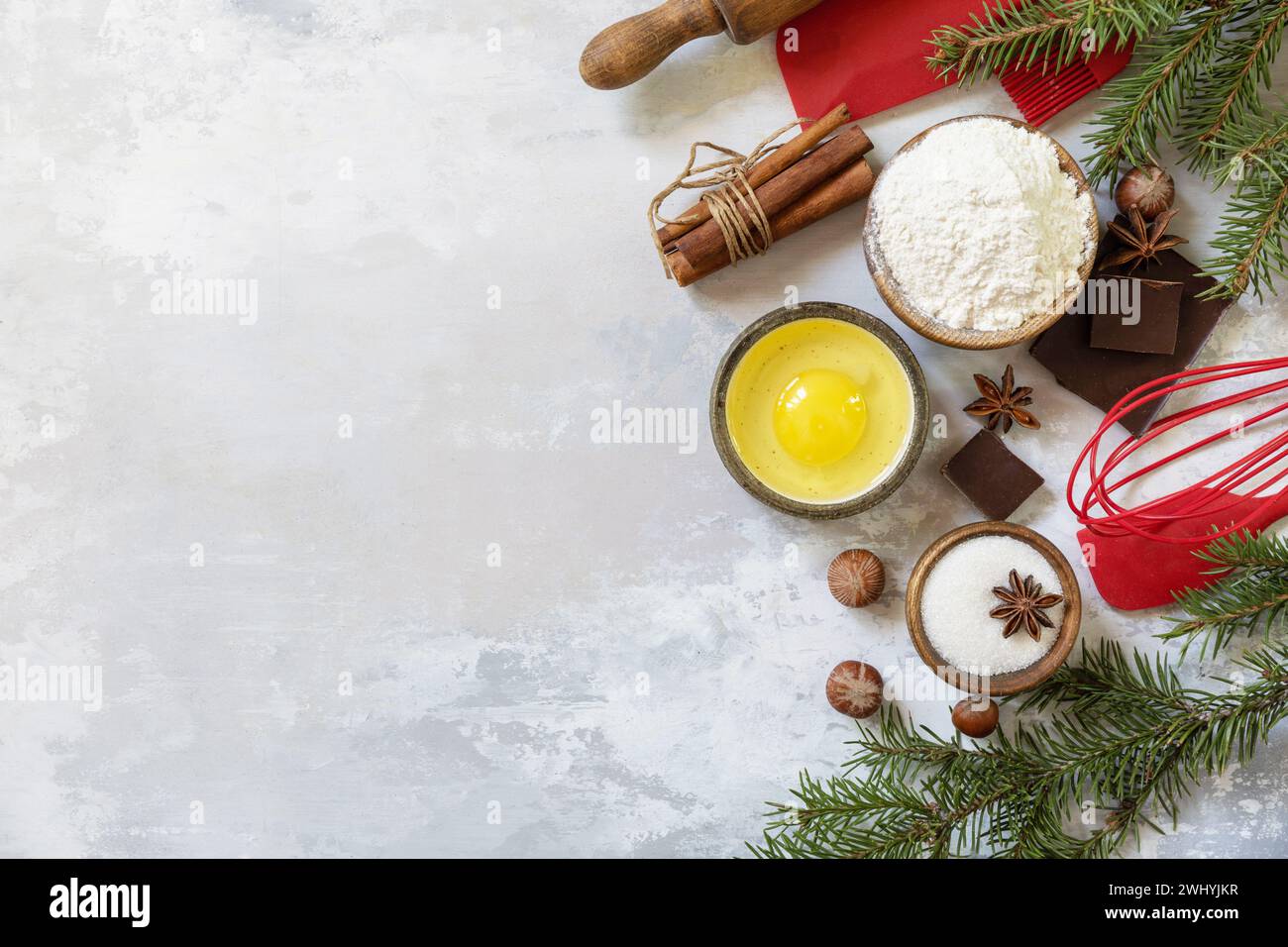 Christmas baking background with fir tree made from kitchen utensils ...