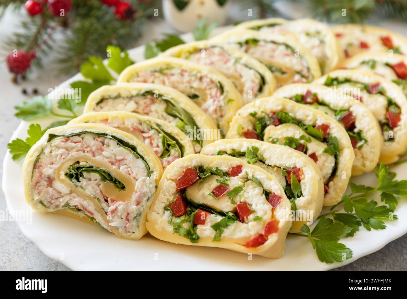 Creative appetizers christmas. Cheese rolls with crab sticks, cream ...
