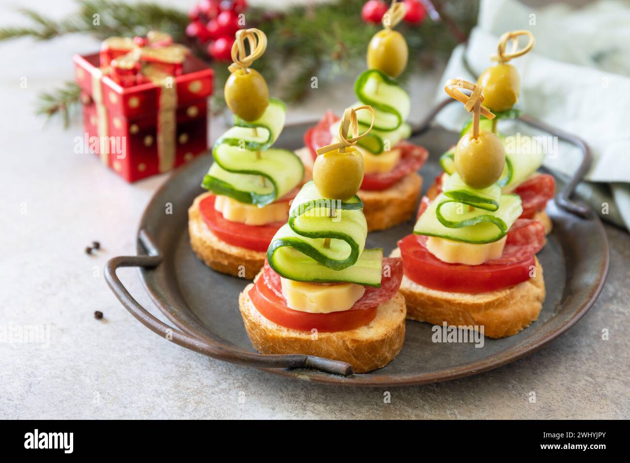 Creative appetizers christmas. Christmas tree canapes of salami, cheese ...