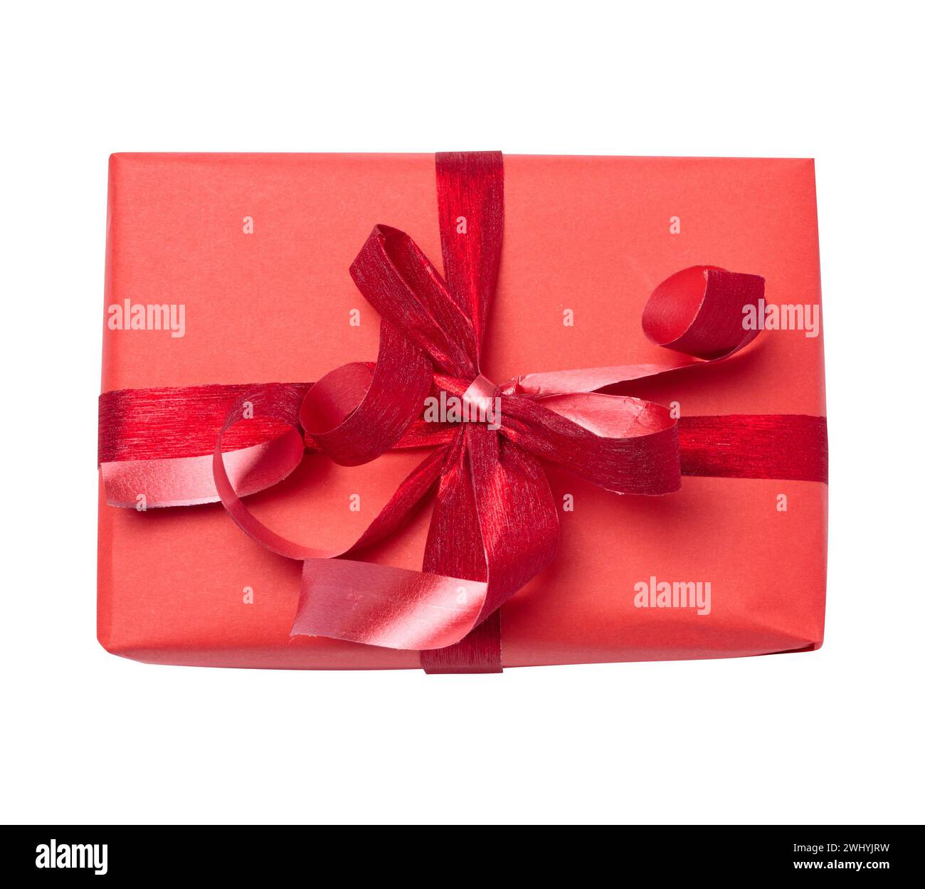 The box is wrapped in red gift wrapping and red ribbon on a white ...