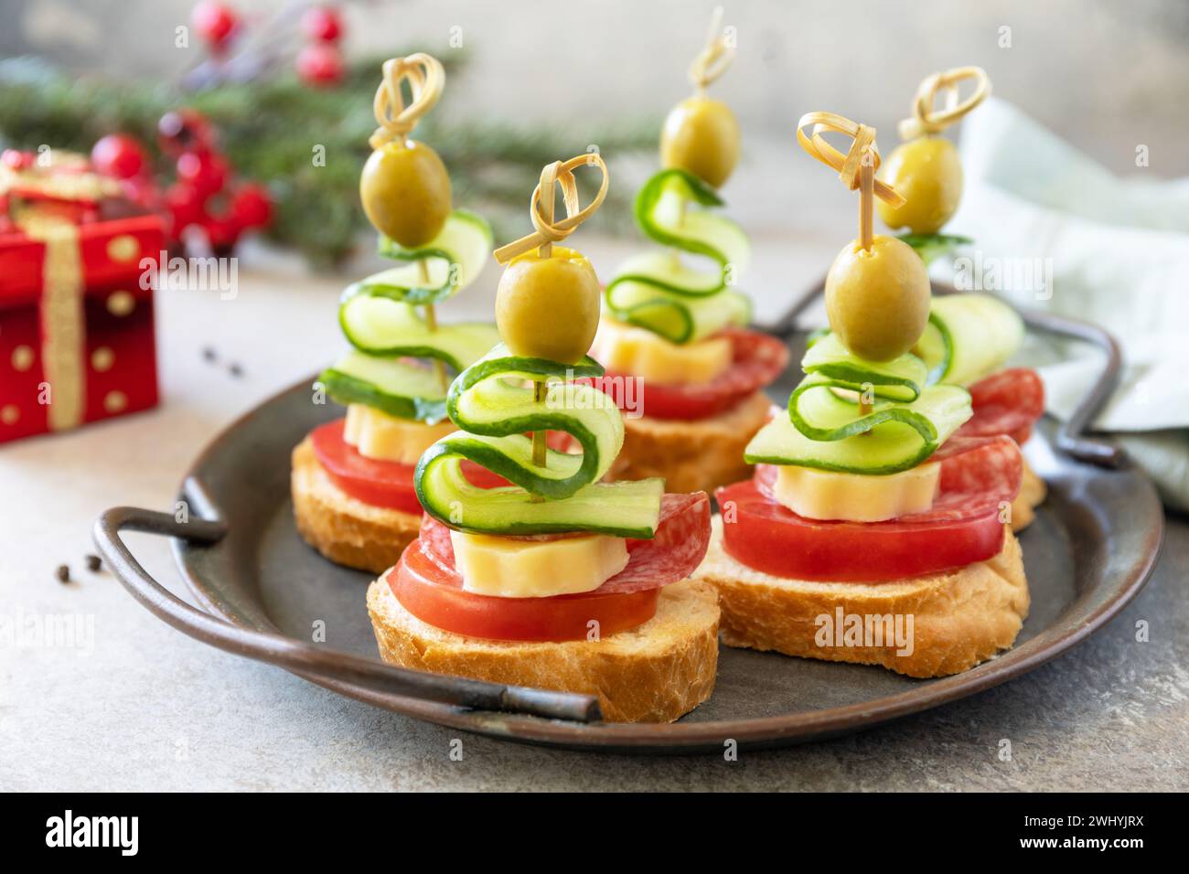 Creative appetizers christmas. Christmas tree canapes of salami, cheese ...