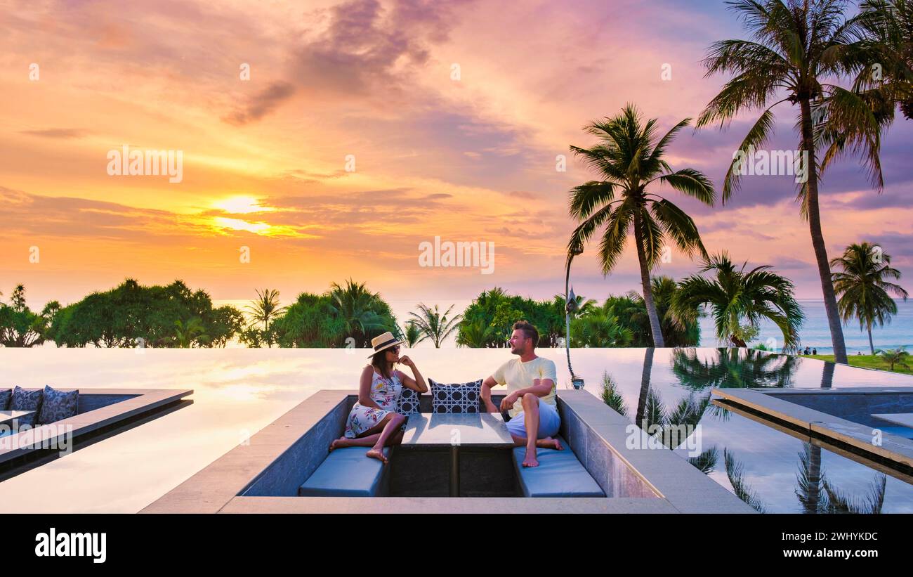 Couple luxury infinity pool hi-res stock photography and images - Alamy