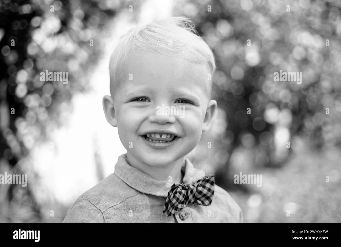 Sunny portrait of little boy. Spring smiling child. Happy childhood ...