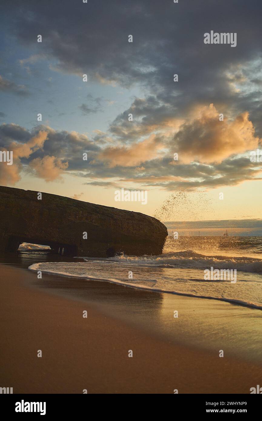 Old WW2 Bunker at danish coast on sunset Stock Photo - Alamy