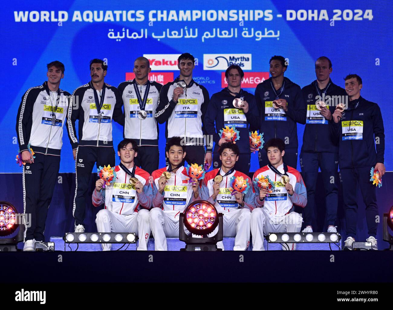 Doha, Qatar. 11th Feb, 2024. Gold medalists of Team China (front), silver medalists of Team ...