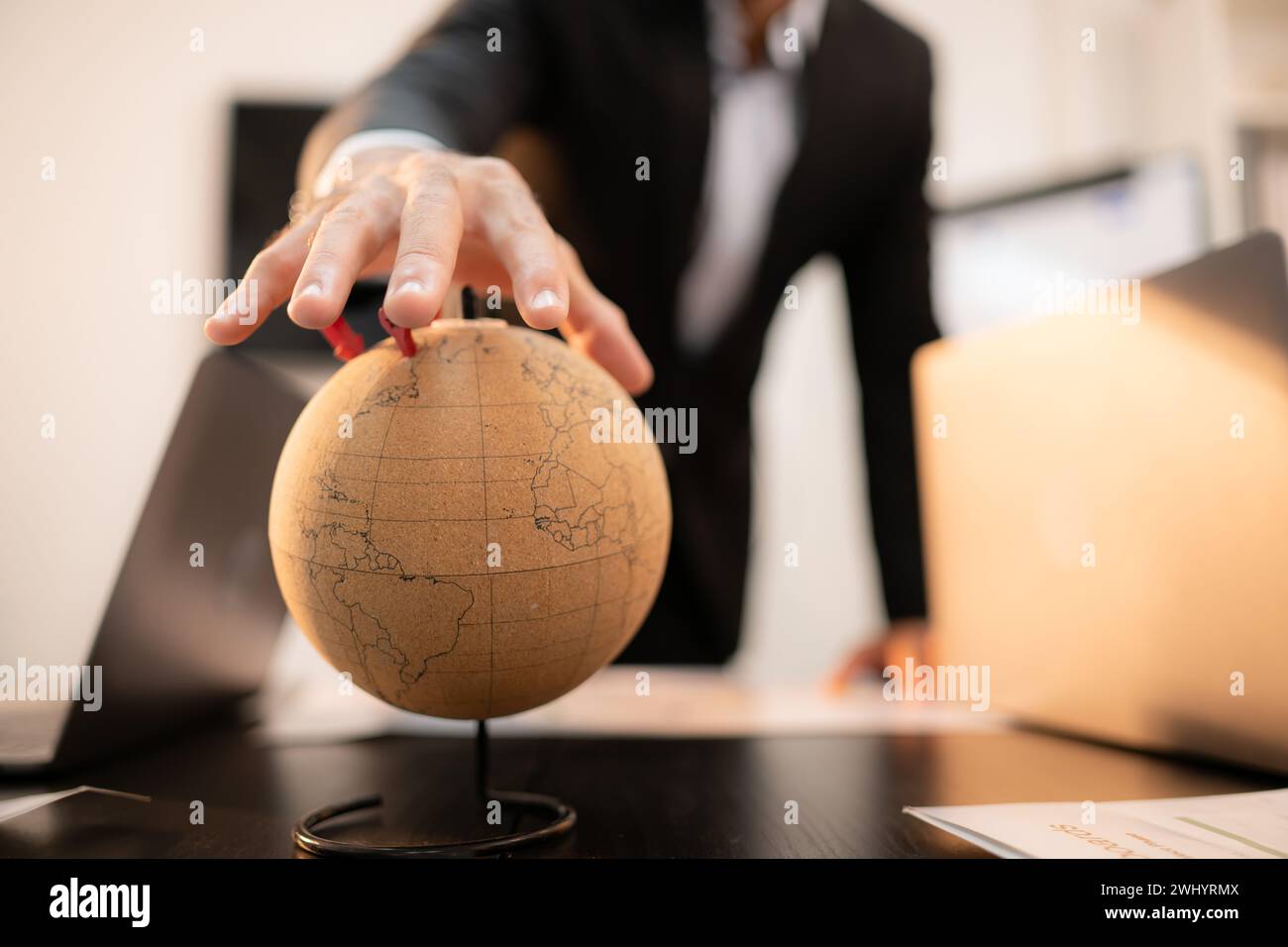 International business concept, businessman and globe model Stock Photo ...