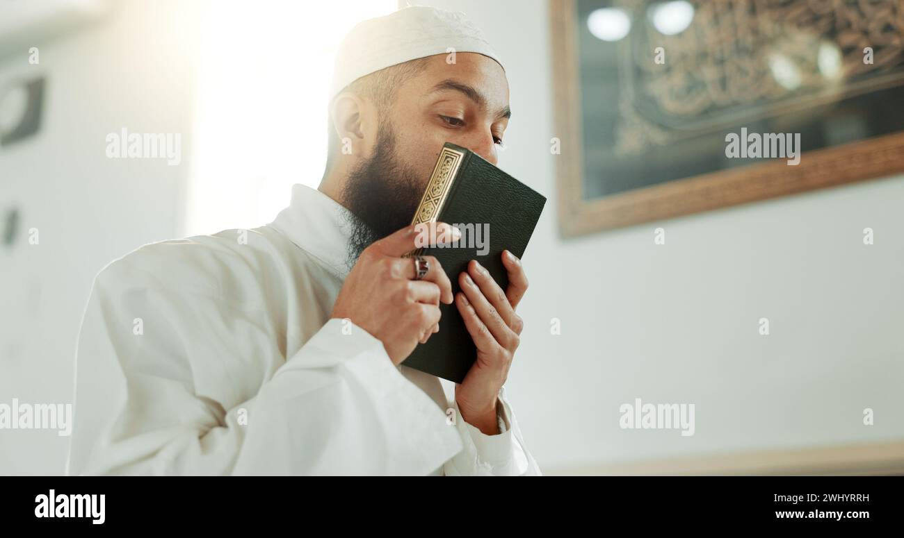 Islam, kiss and man in mosque with Quran, mindfulness and gratitude in ...