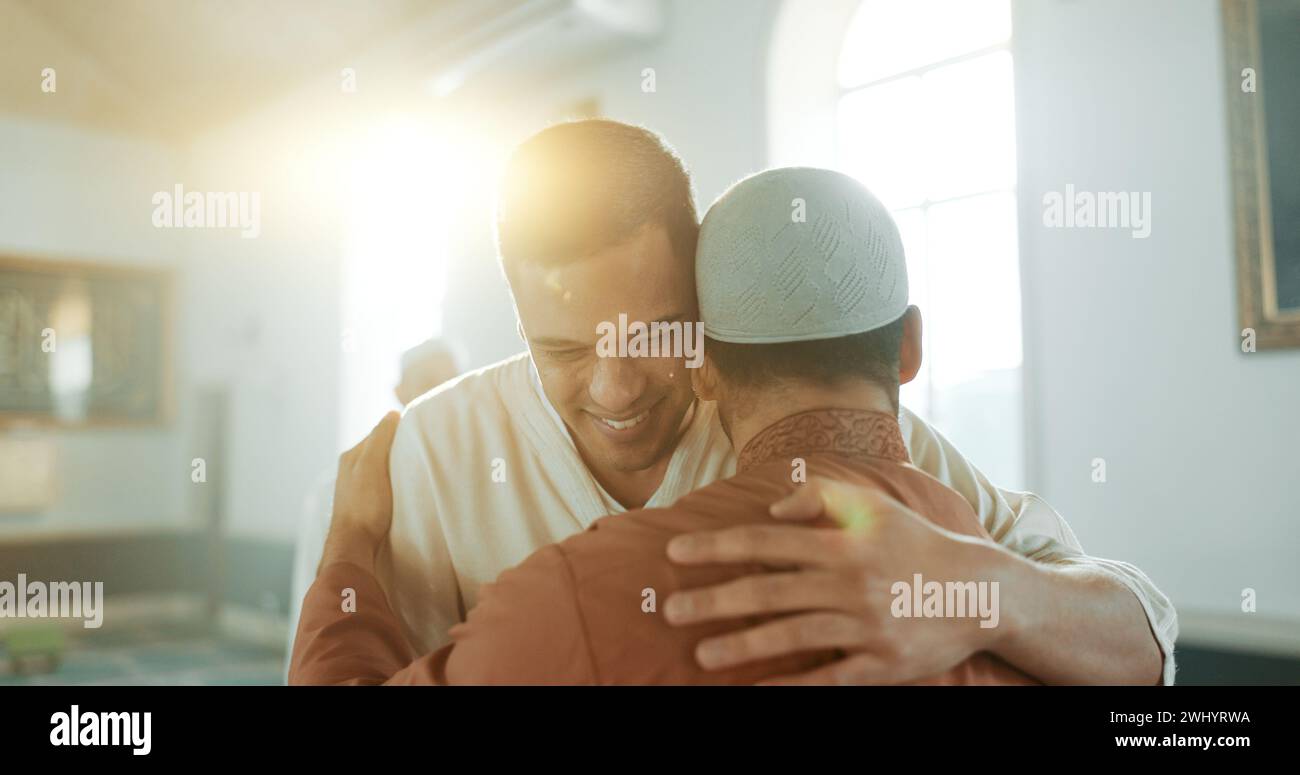 Eid mubarak greeting hug embrace hi-res stock photography and images ...