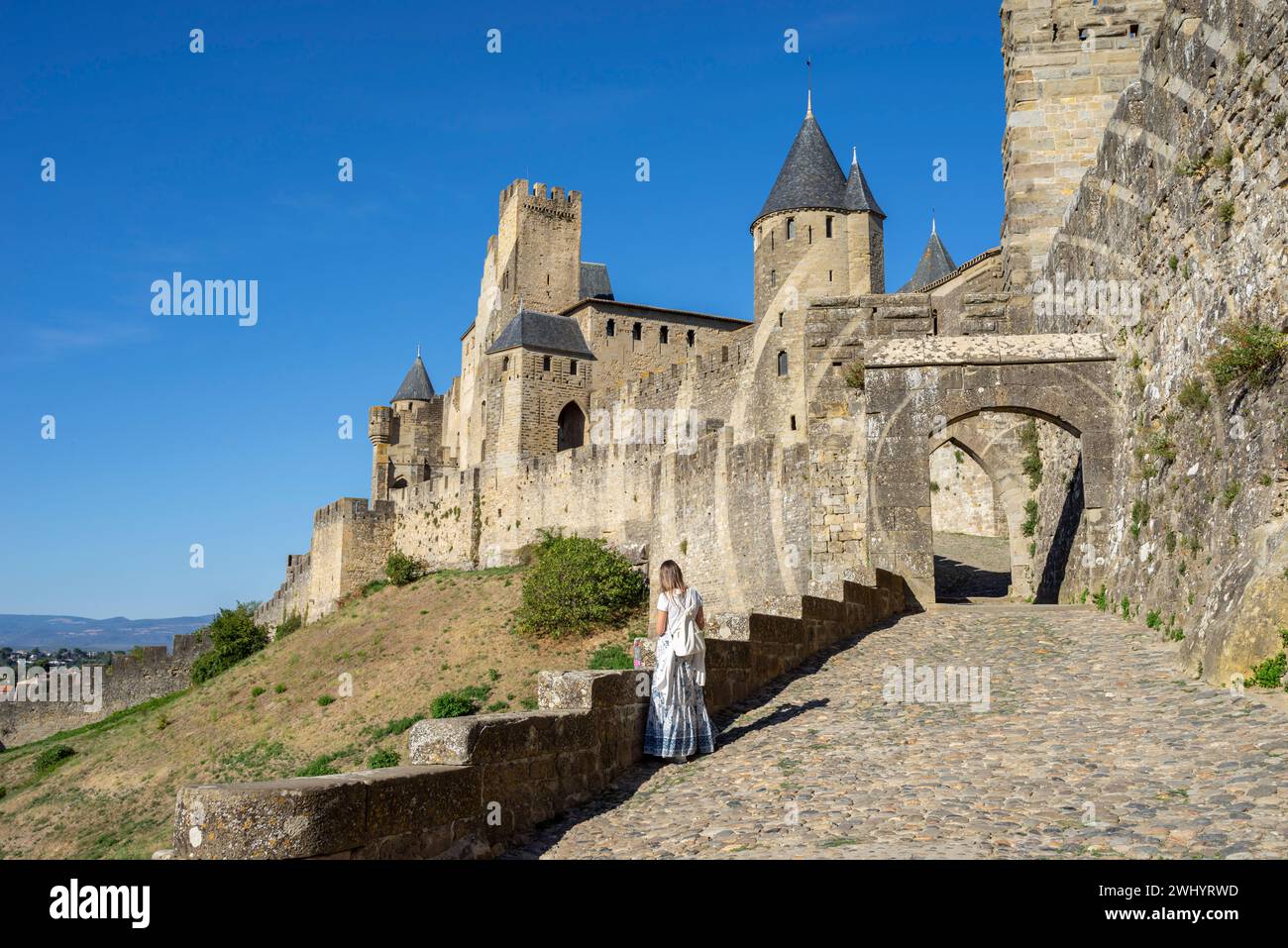 Woman and gate and alone hi-res stock photography and images - Alamy