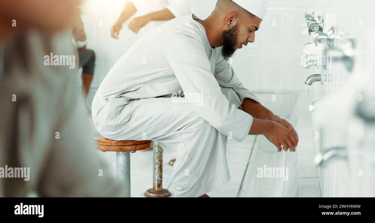 Muslim, hygiene and men washing before prayer in bathroom for purity ...