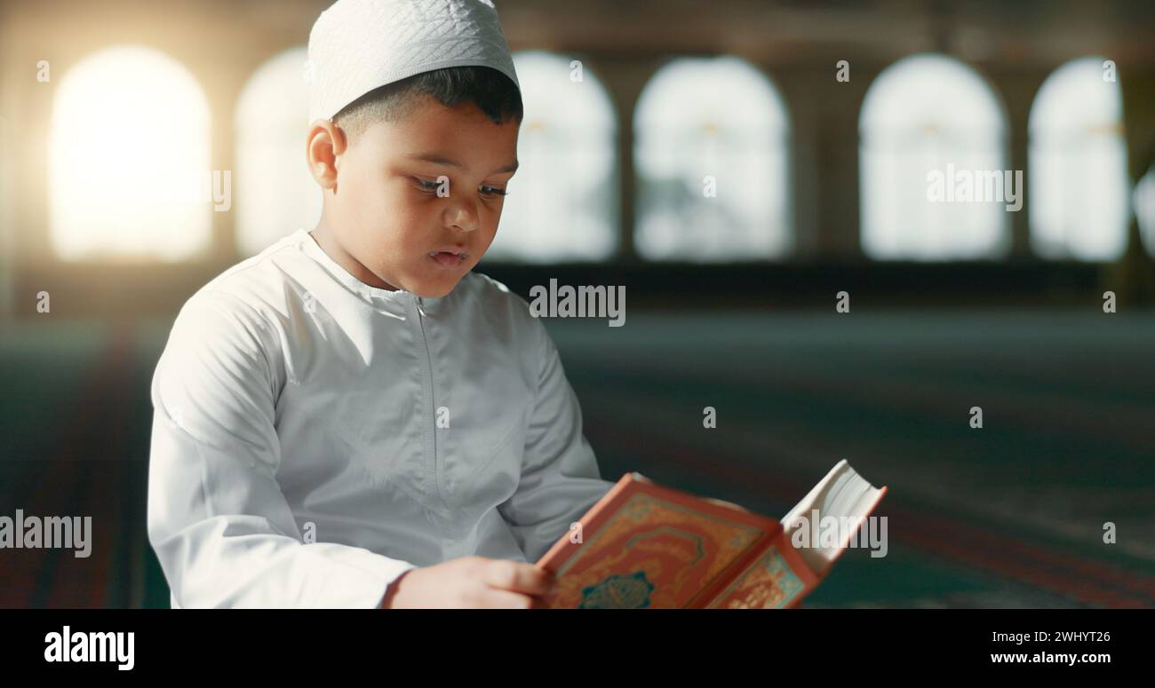 Islam, child in mosque reading Quran for learning, mindfulness and ...