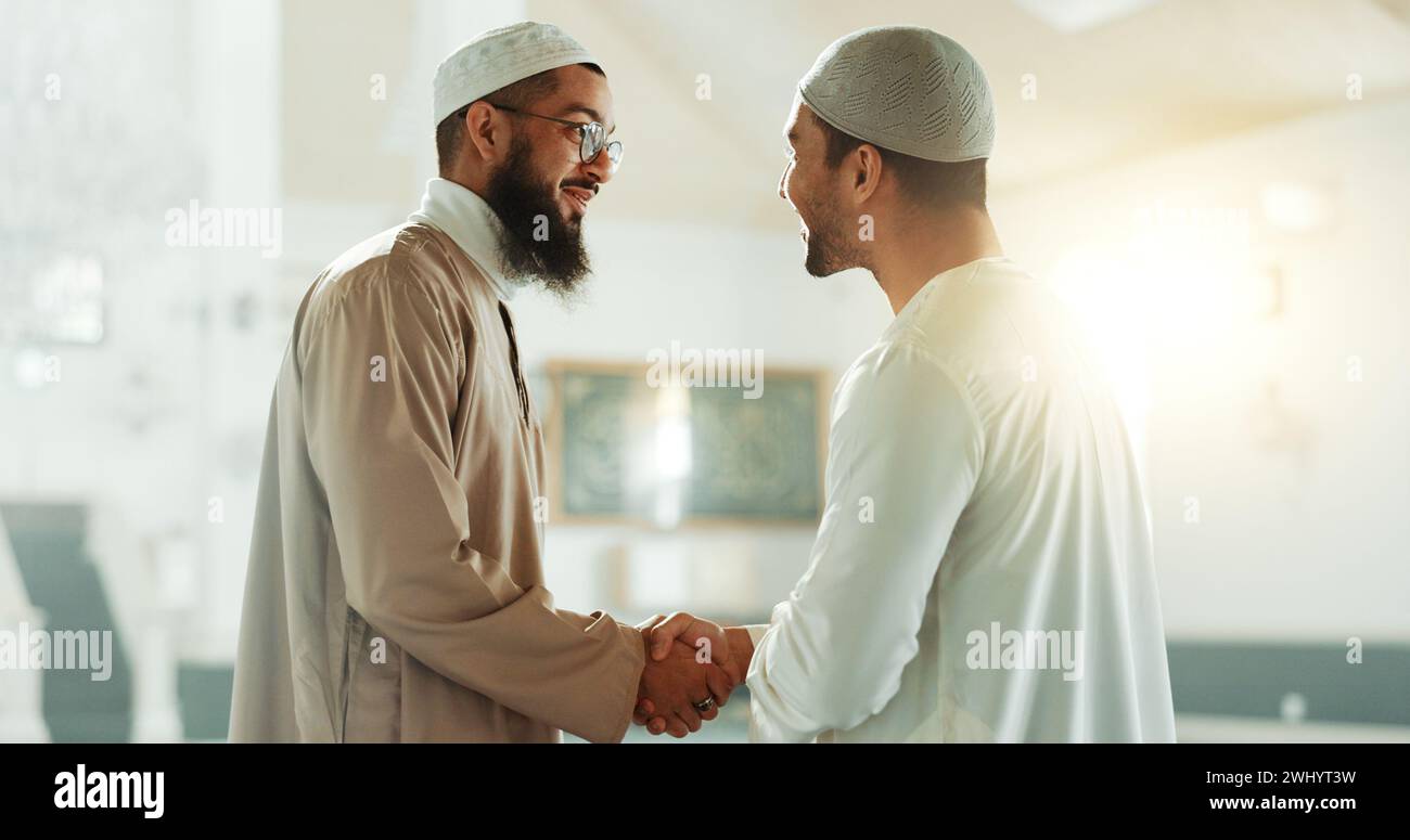 Muslim, handshake and people in mosque for greeting, conversation and ...