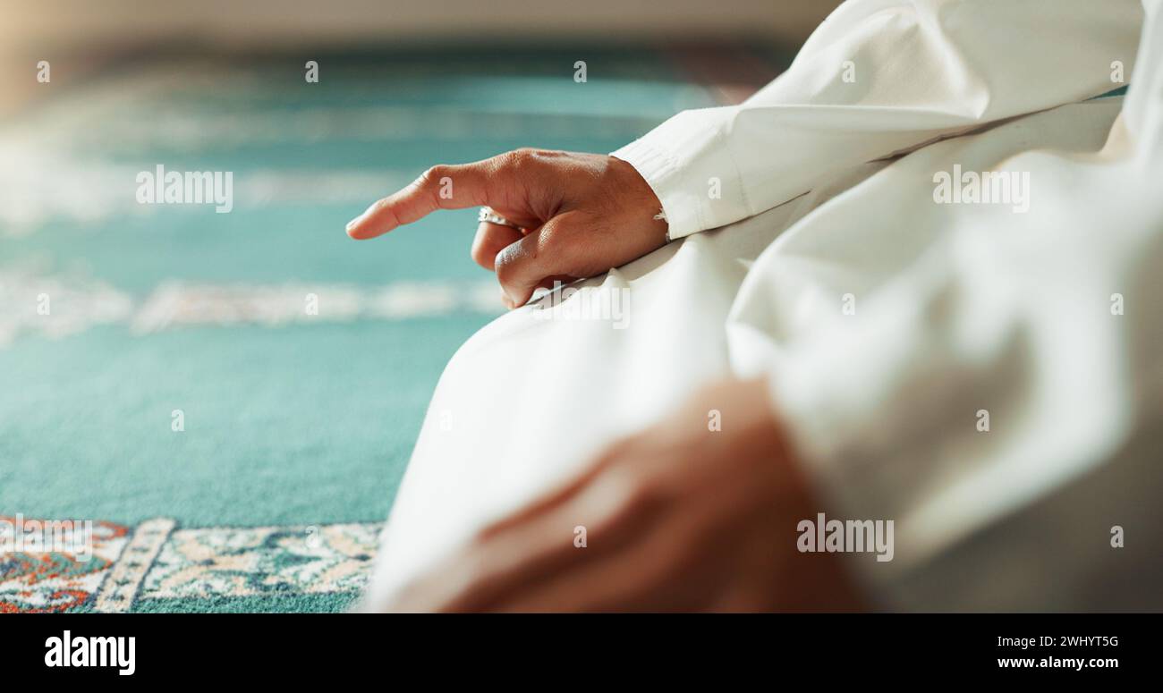 Islam, floor and closeup of a pointing finger or person at a mosque for ...