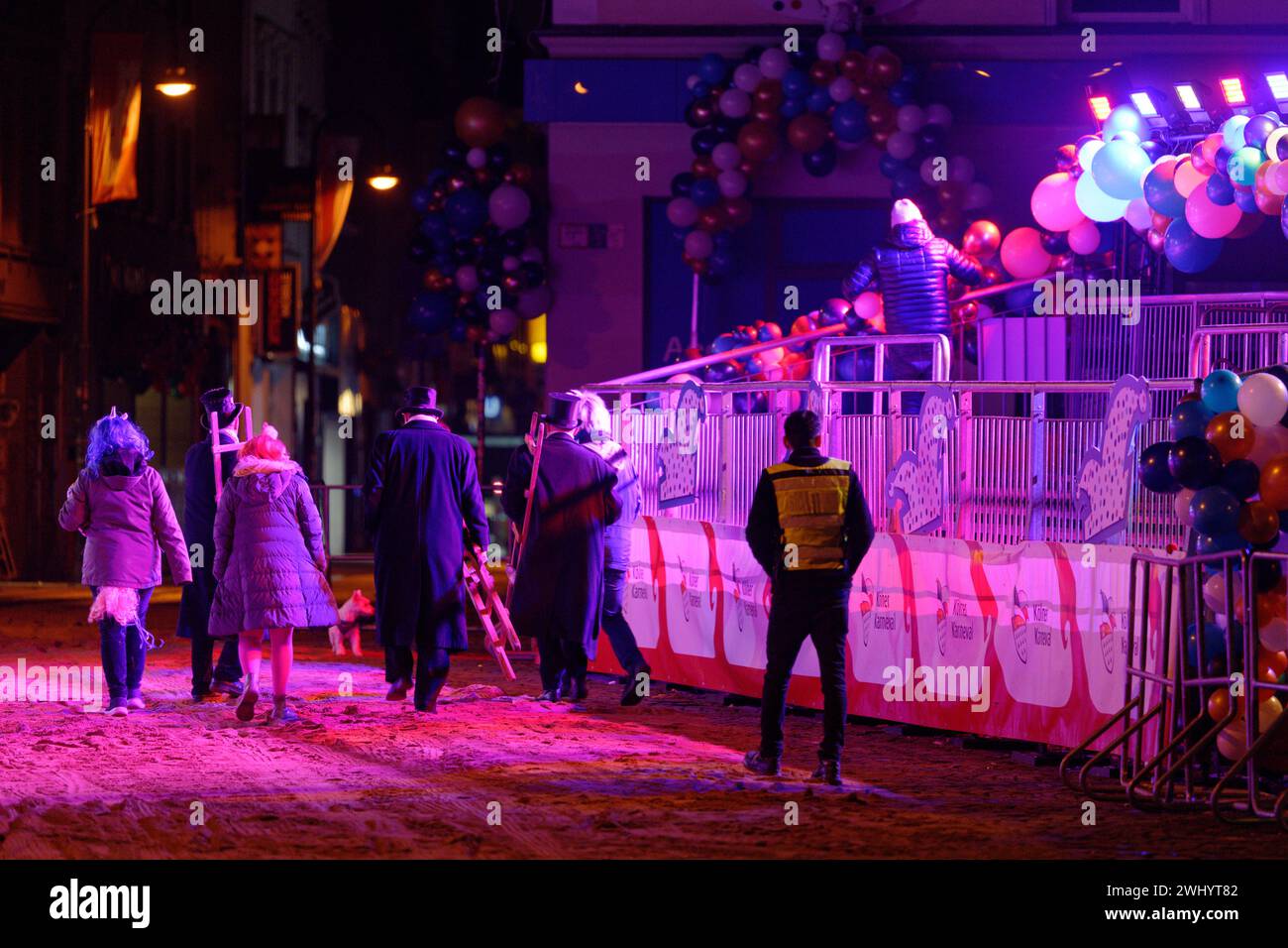 Cologne, Germany. 12th Feb, 2024. Carnival revelers walk through ...