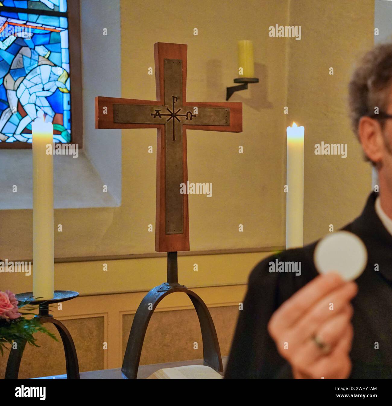 Pastor at communion Stock Photo - Alamy