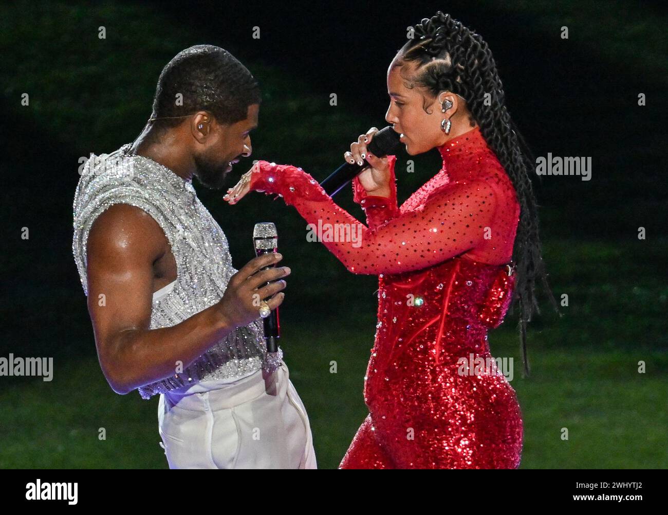 Alicia Keys performs with Usher during the Apple Music Halftime Show at ...