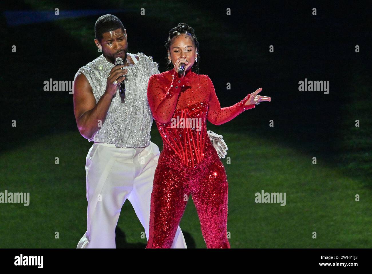 Alicia Keys performs with Usher during the Apple Music Halftime Show at ...