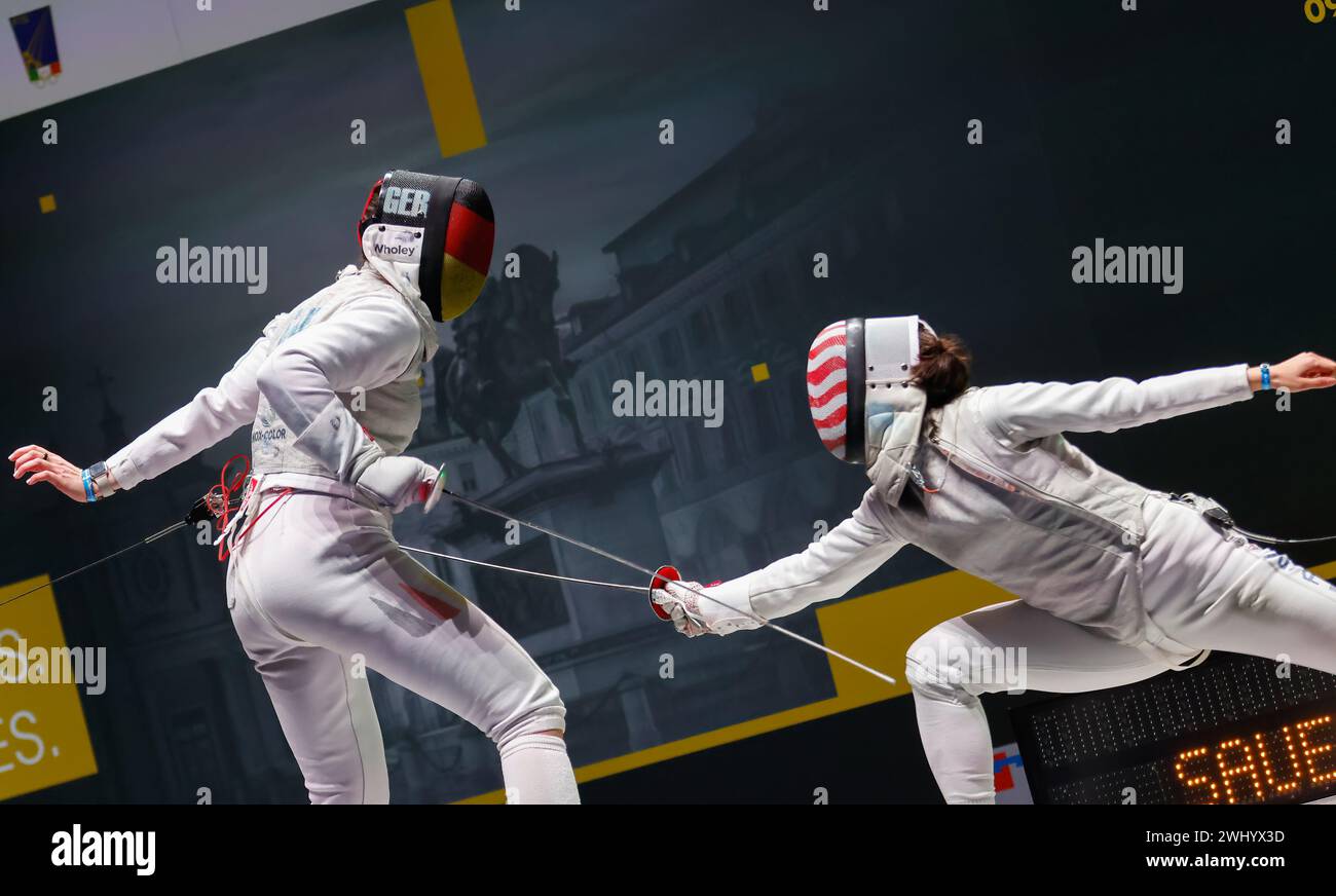 Anne Sauer of Germany (R) and Lee Kiefer of United States (R) in action ...