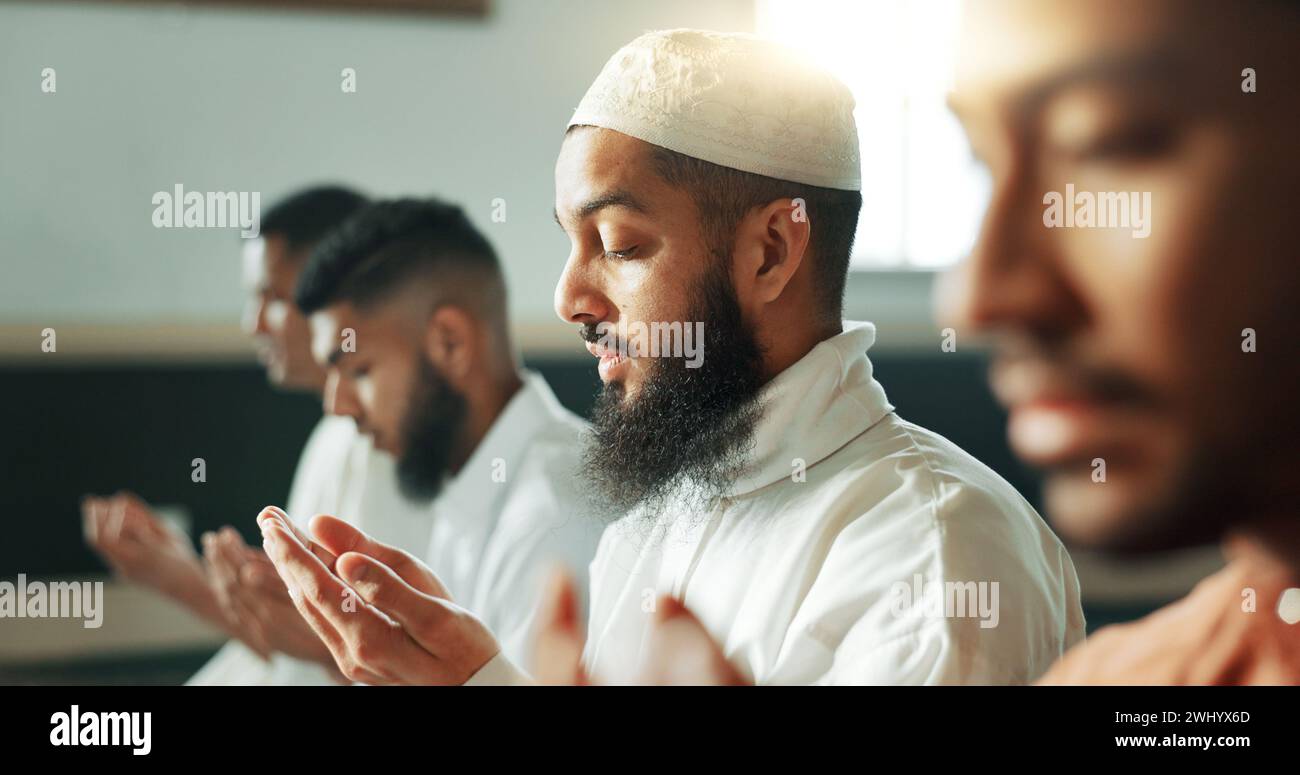 Muslim, praying and group in a Mosque for spiritual religion together ...