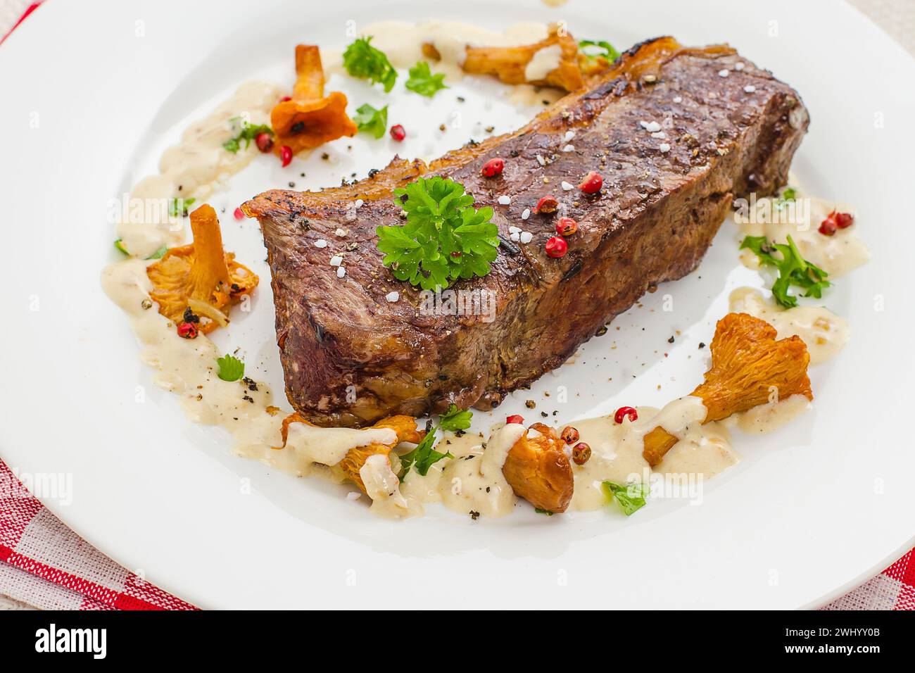 Grilled rump steak with chanterelle, sauce Stock Photo - Alamy