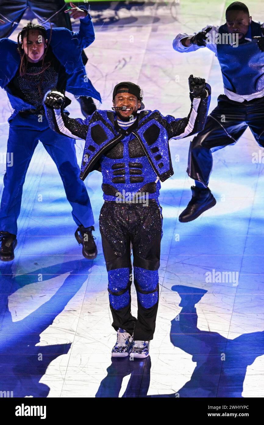 Usher performs during the Apple Music Halftime Show at Super Bowl LVIII ...