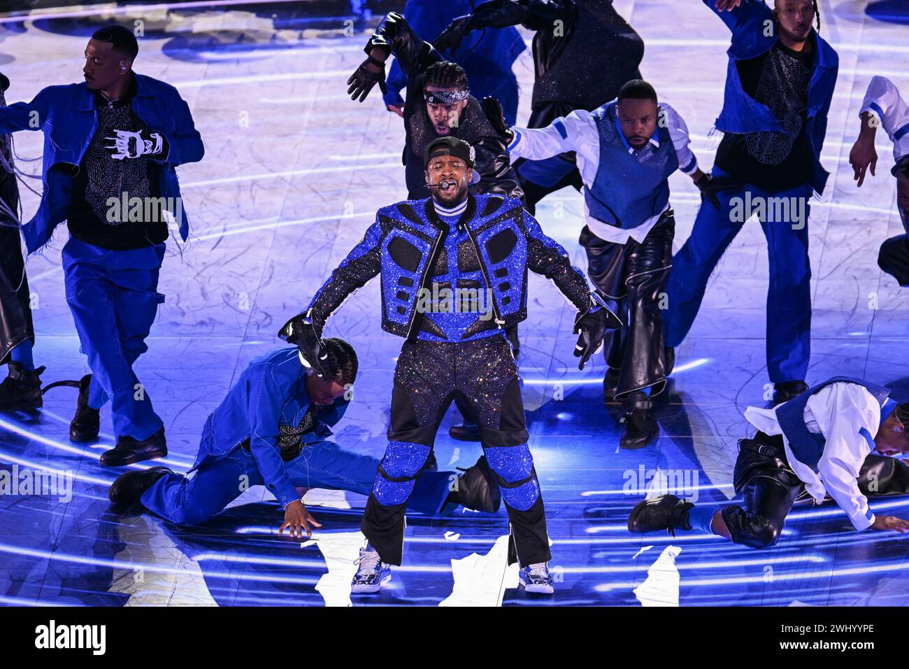Usher performs during the Apple Music Halftime Show at Super Bowl LVIII ...
