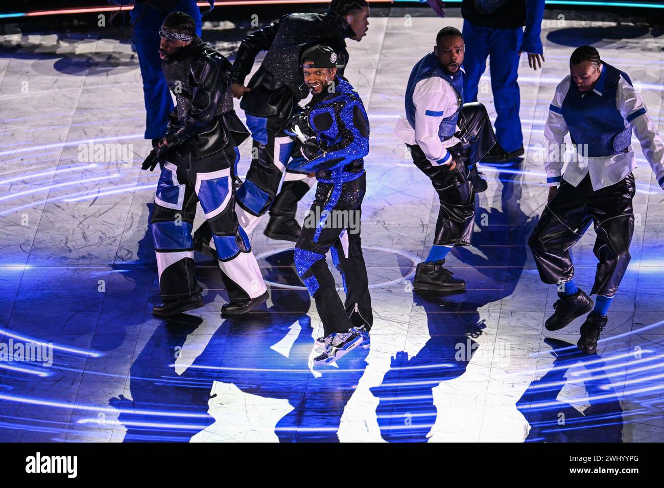 Usher performs during the Apple Music Halftime Show at Super Bowl LVIII ...