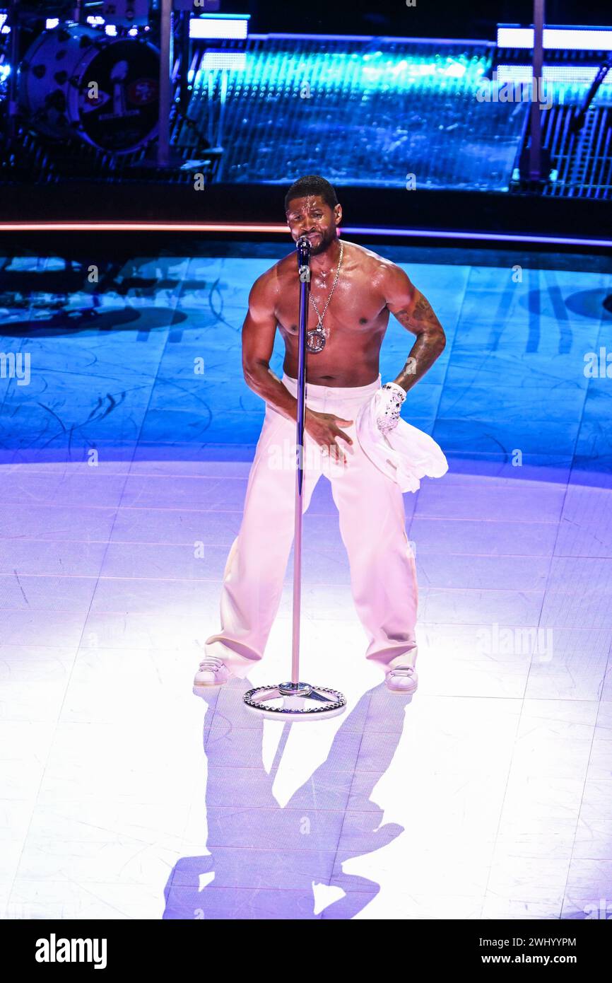 Usher performs during the Apple Music Halftime Show at Super Bowl LVIII ...