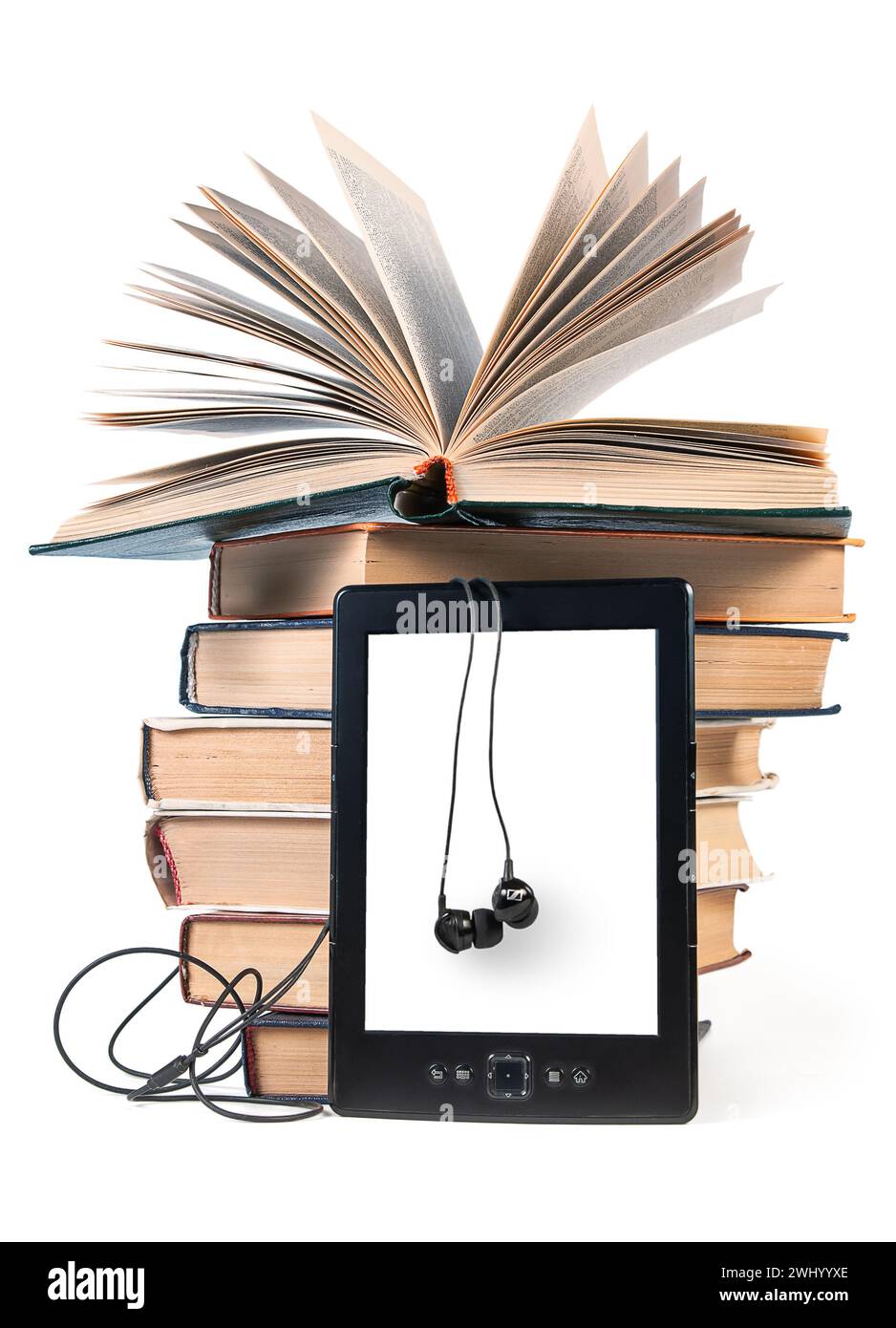 Traditional paper books, e-book and headphones isolated on a white ...