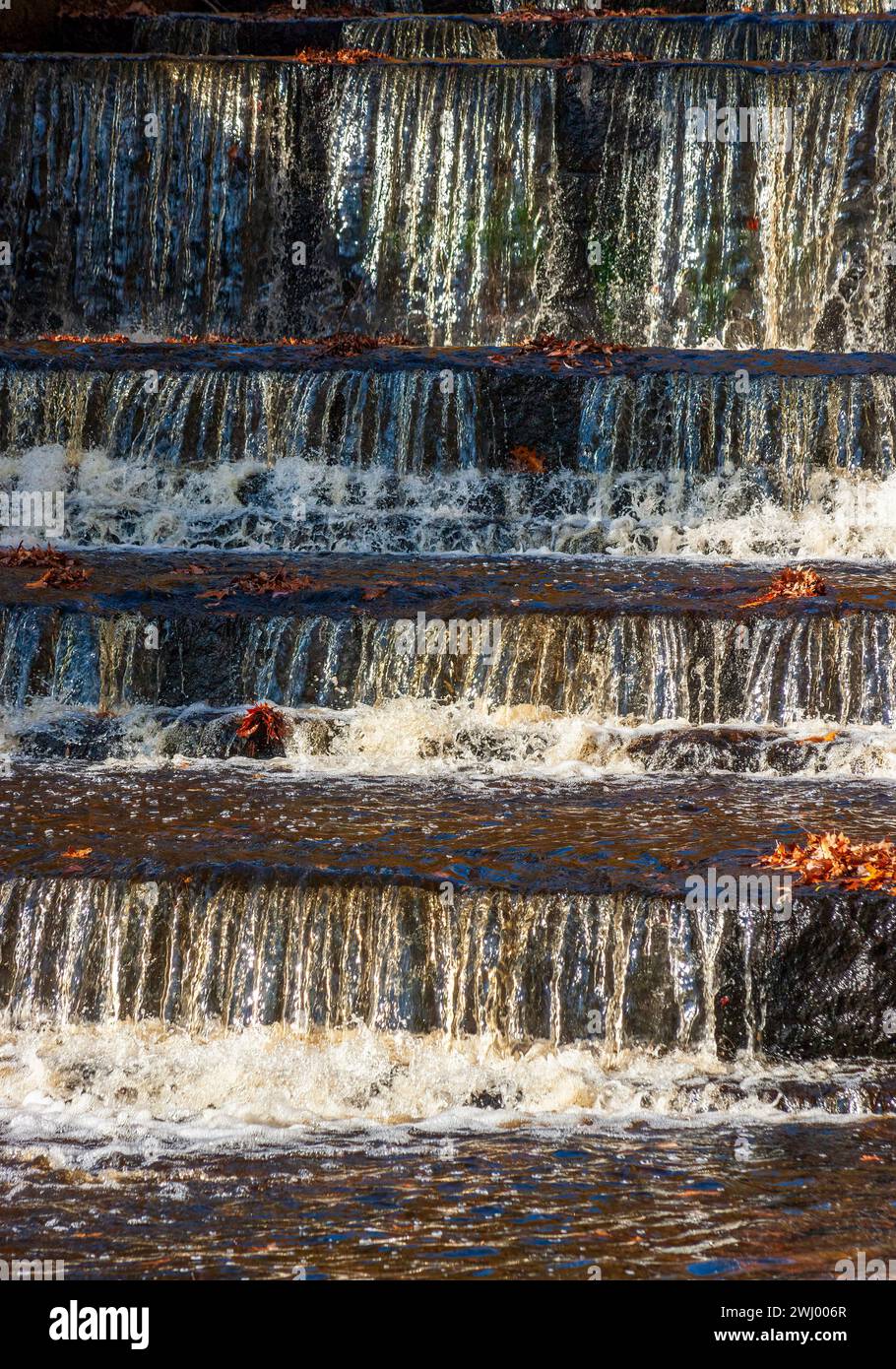 Several small cascades over the granite steps of the Hopkinton Dam ...