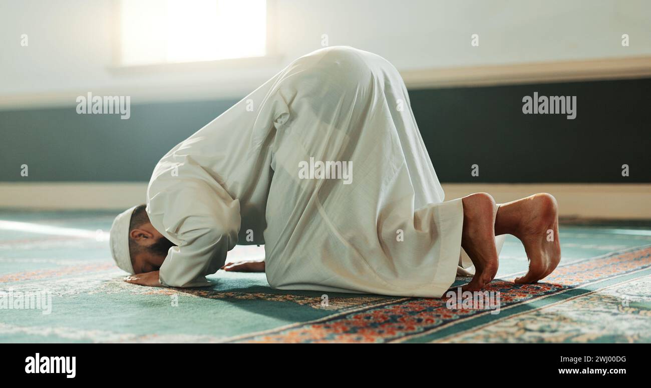 Praying, Muslim and man with faith in a mosque for praying, peace and ...