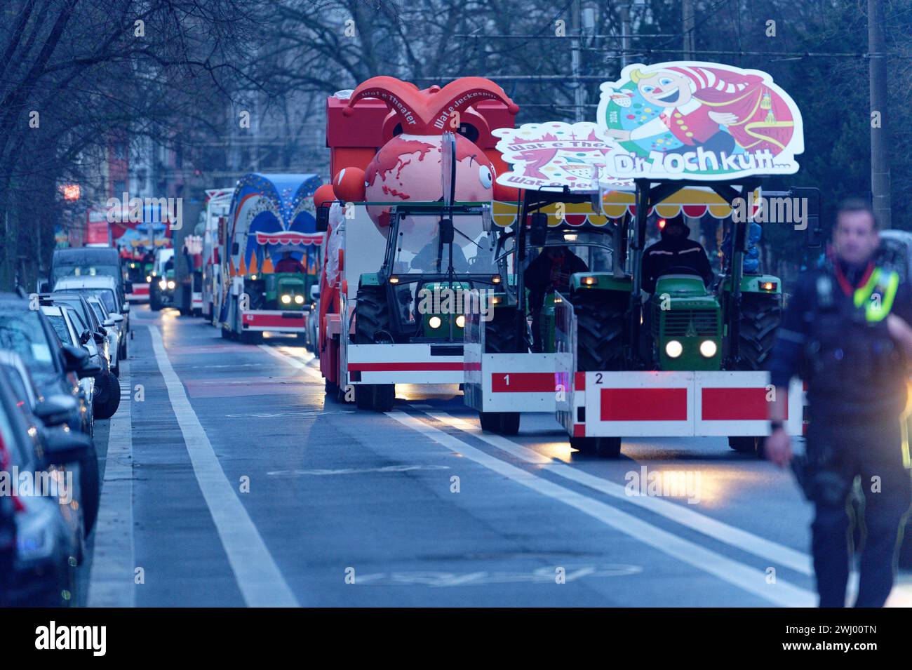 Cologne, Germany. 12th Feb, 2024. Carnival floats drive to their ...
