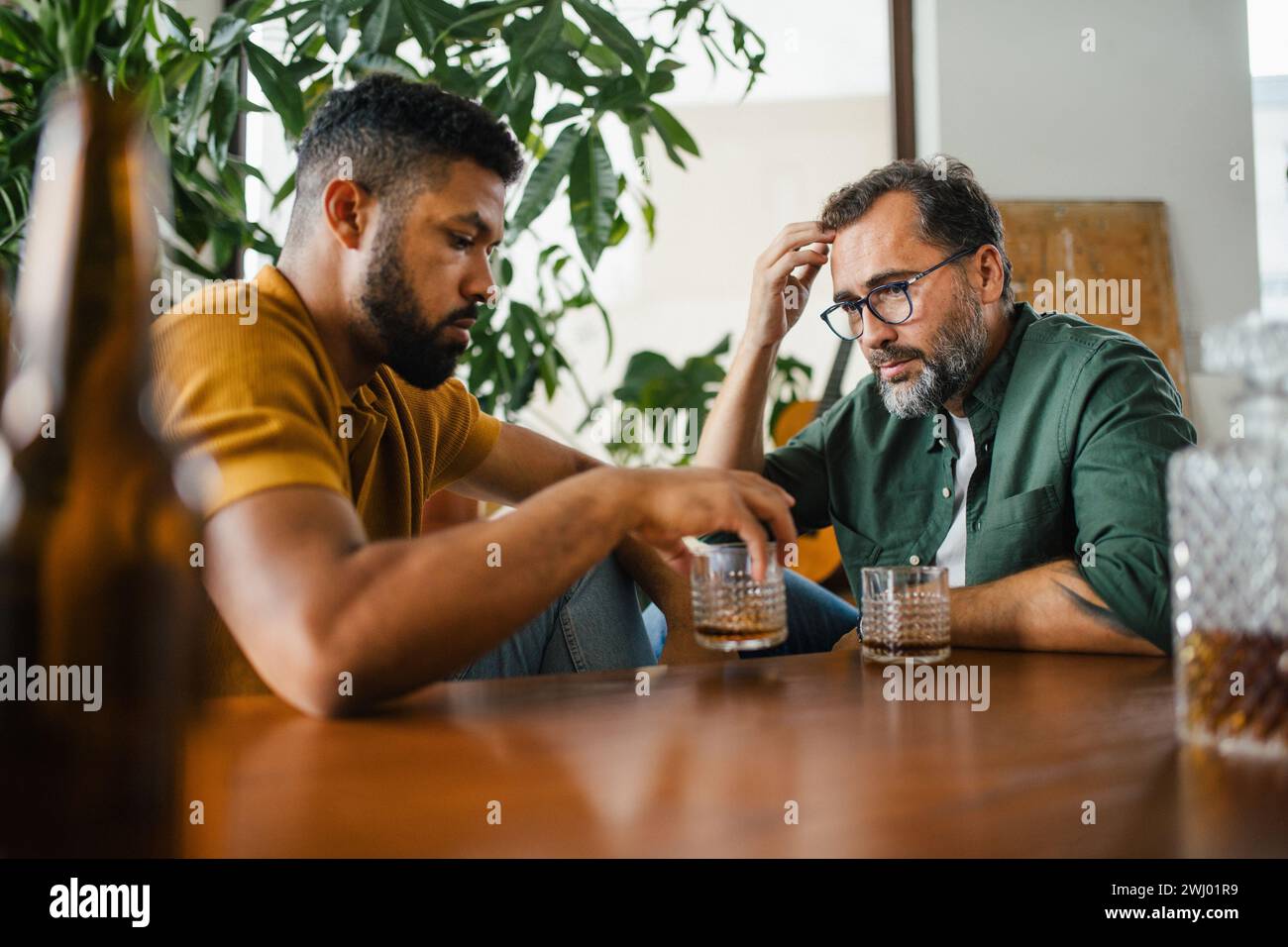 Best friends, supporting each other, drinking whiskey and talking ...