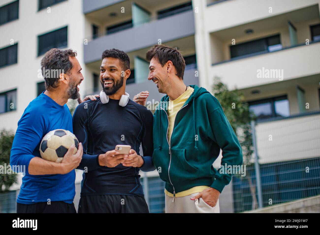 Best friends playing sport outdoors, having fun, competing. Playing ...