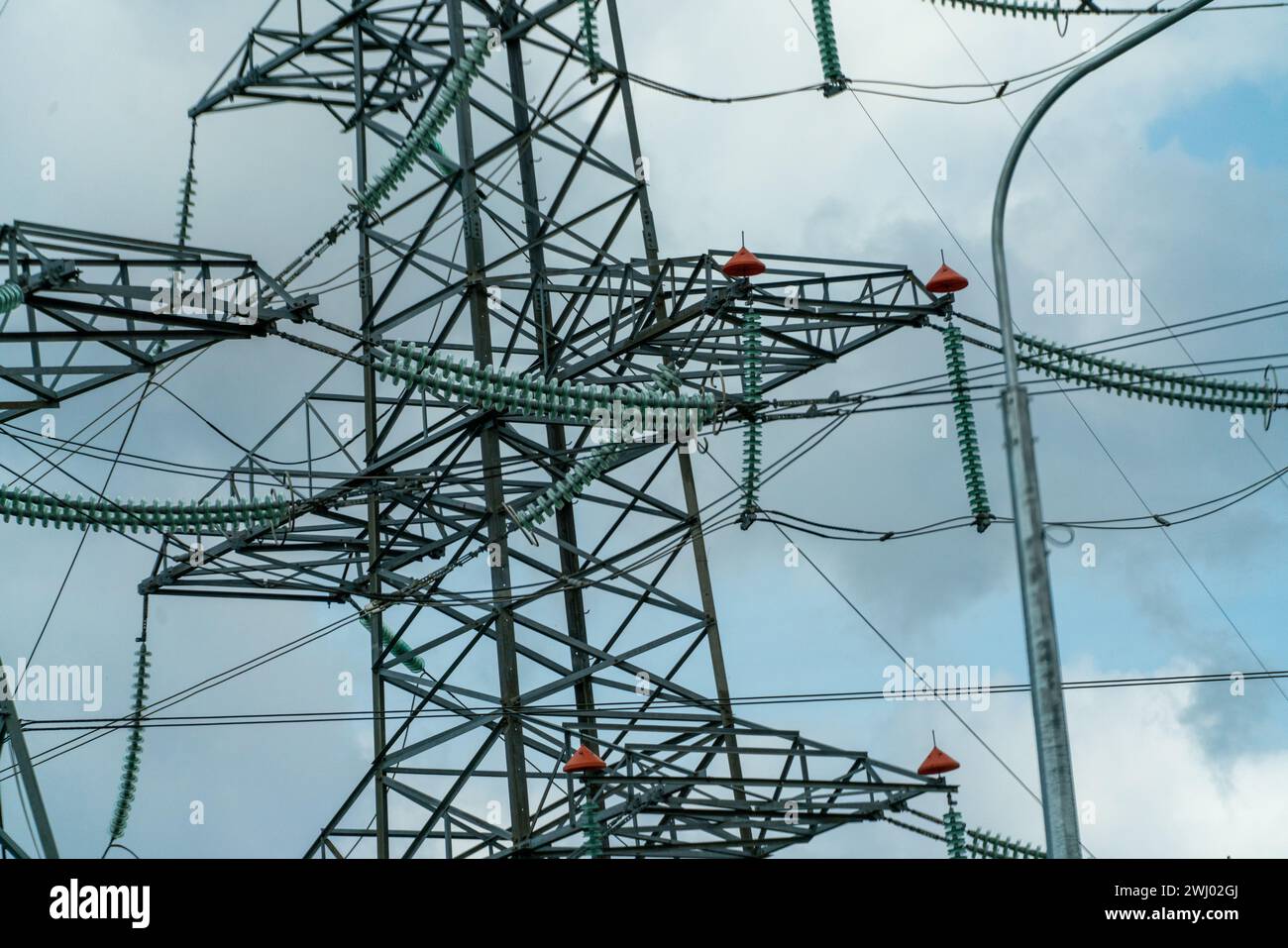 High voltage towers with sky background. Power line support with wires ...