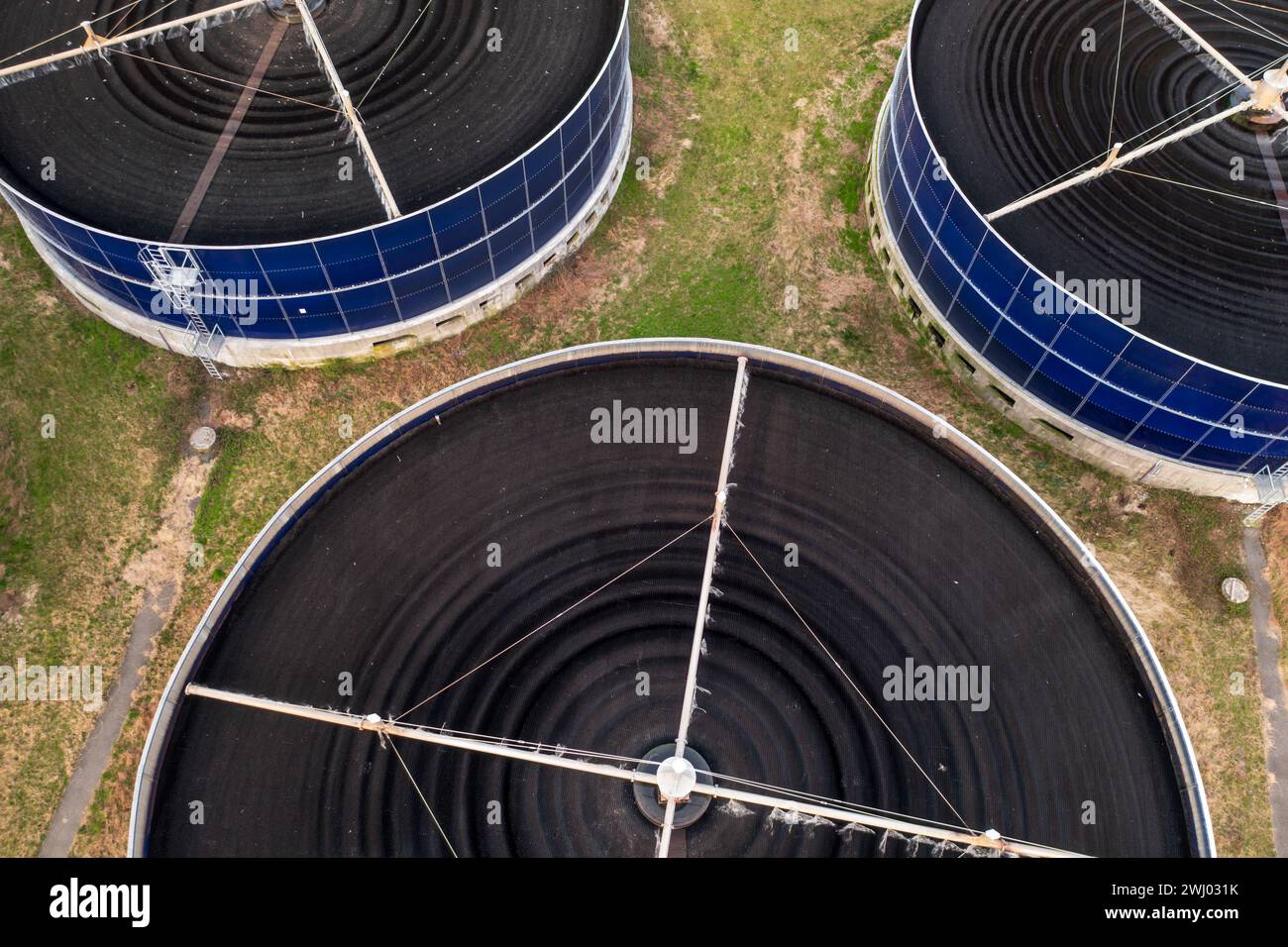 Aerial top view of massive round water tank for water filtration in ...