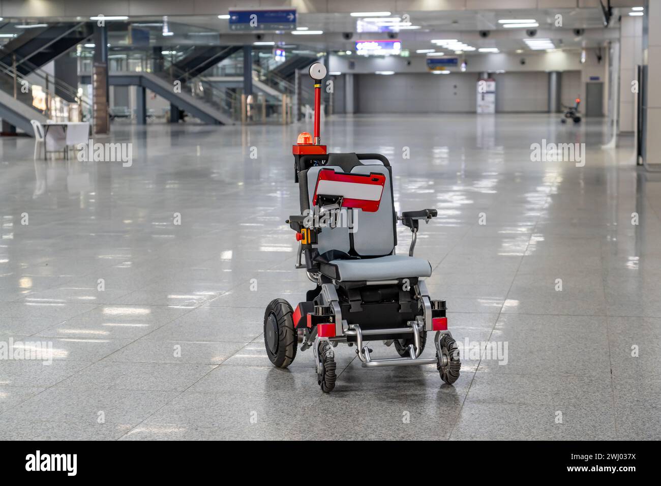 Modern technological wheelchair with a remote control, an artificial ...