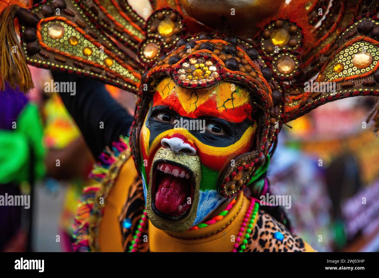 A participant of the parade takes part during the second day of the ...