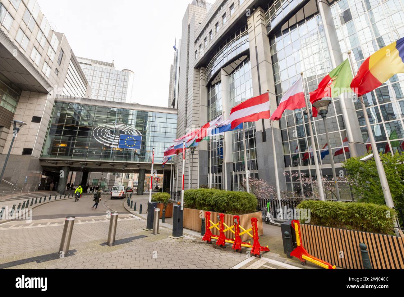 The European Union parliament building with the logo and flags of ...