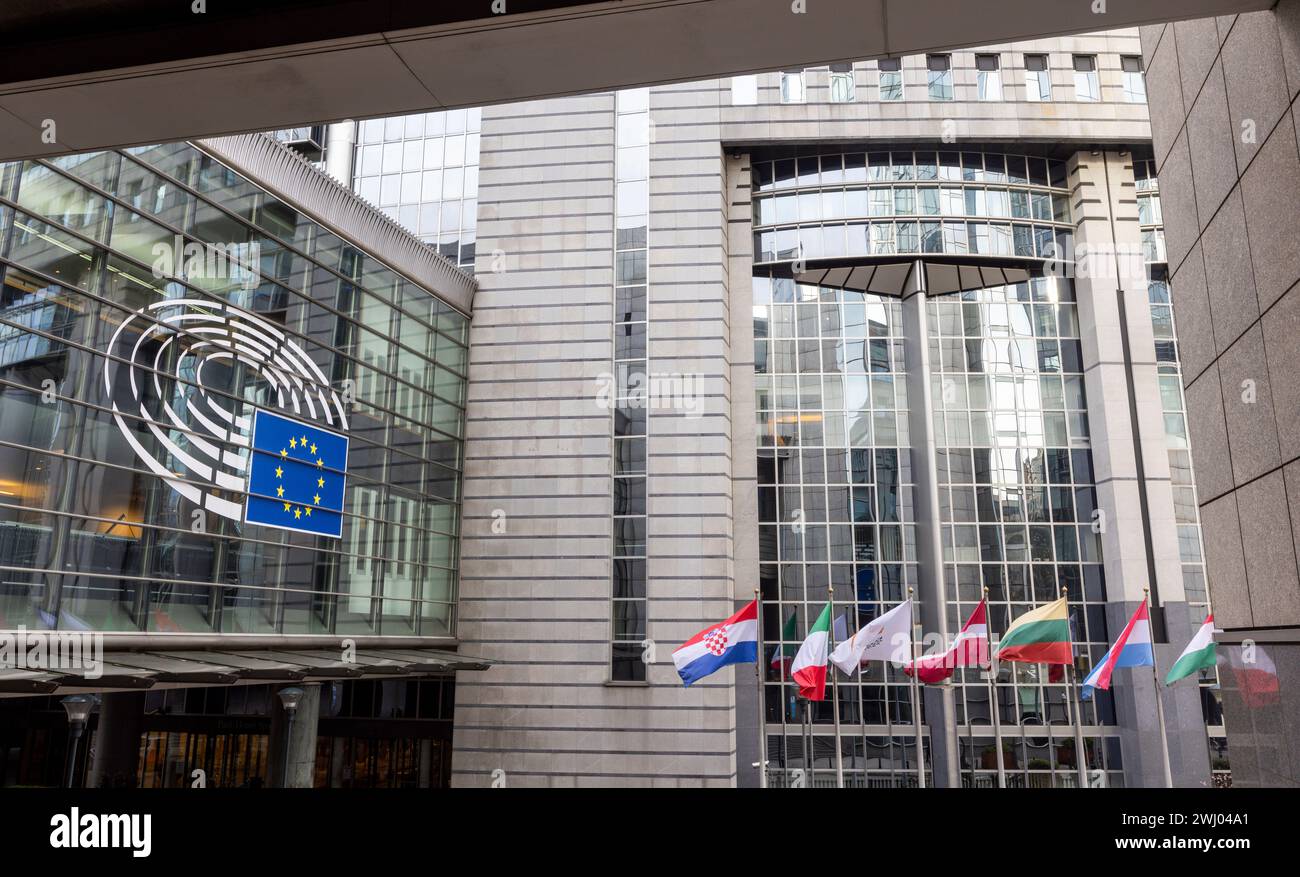 The European Union parliament building with the logo and flags of ...