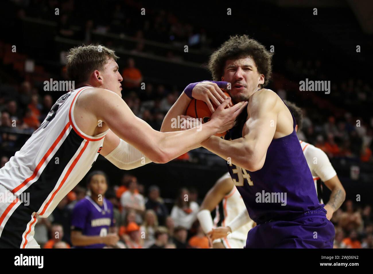 Oregon State forward Tyler Bilodeau, left, and Washington center ...