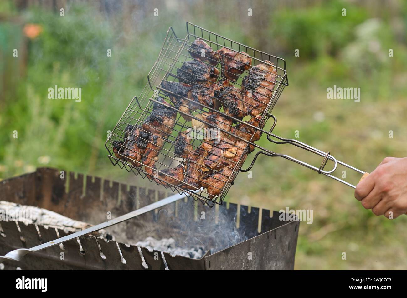 the meat was burnt in the grill Stock Photo - Alamy