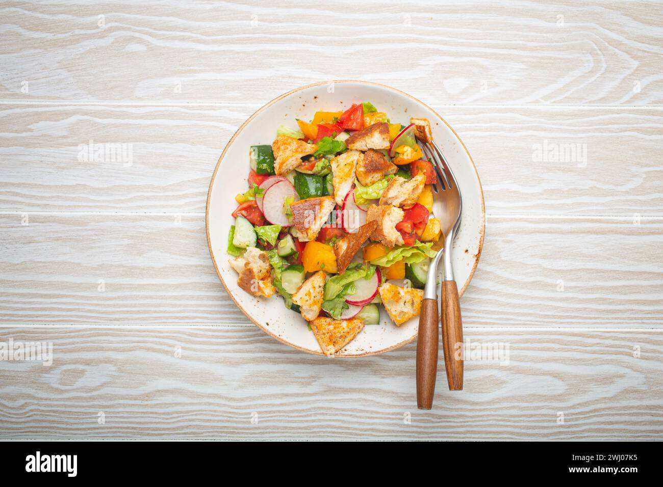 Traditional Levant dish Fattoush salad, Arab cuisine, with pita bread ...