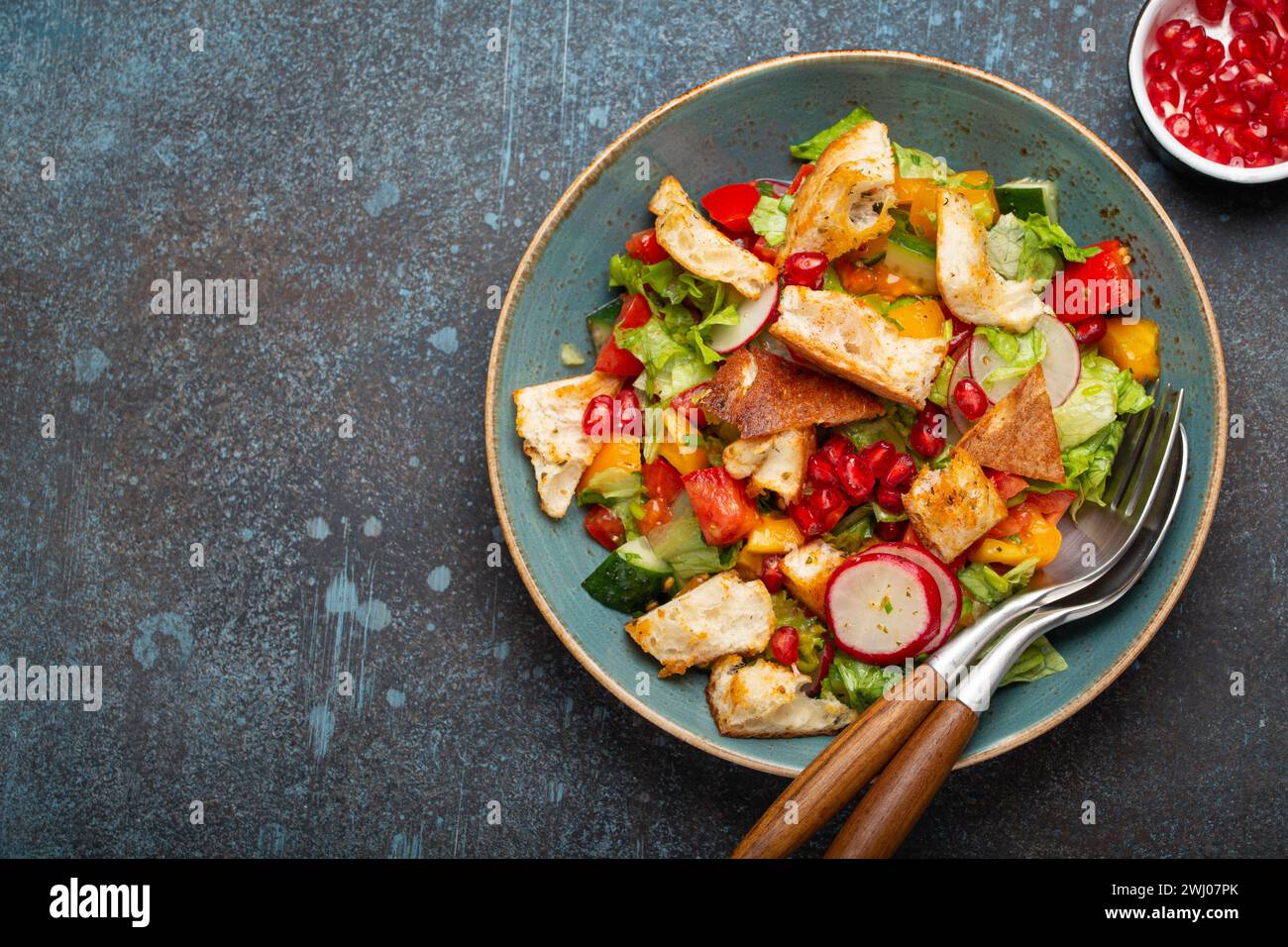 Traditional Levant dish Fattoush salad, Arab cuisine, with pita bread ...