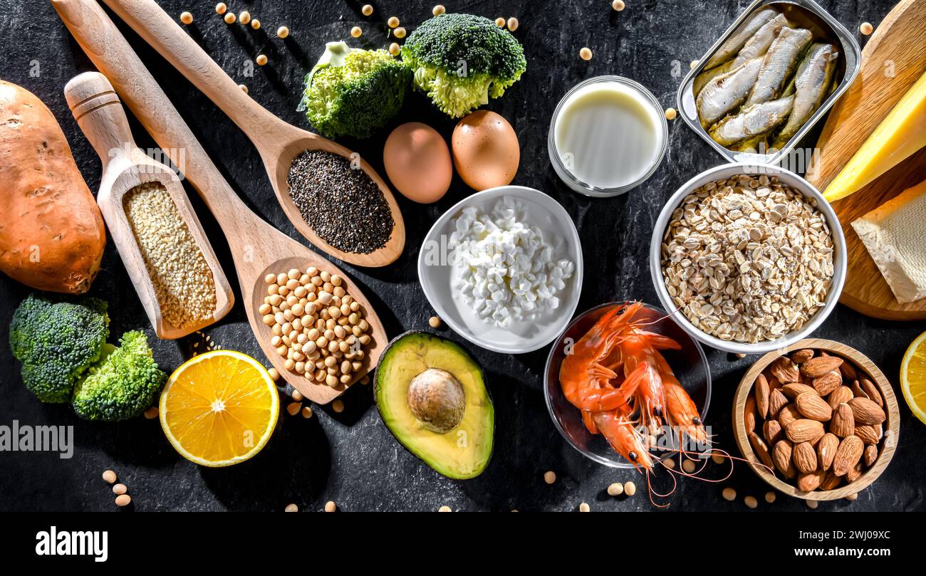 Composition with food products rich in calcium Stock Photo - Alamy