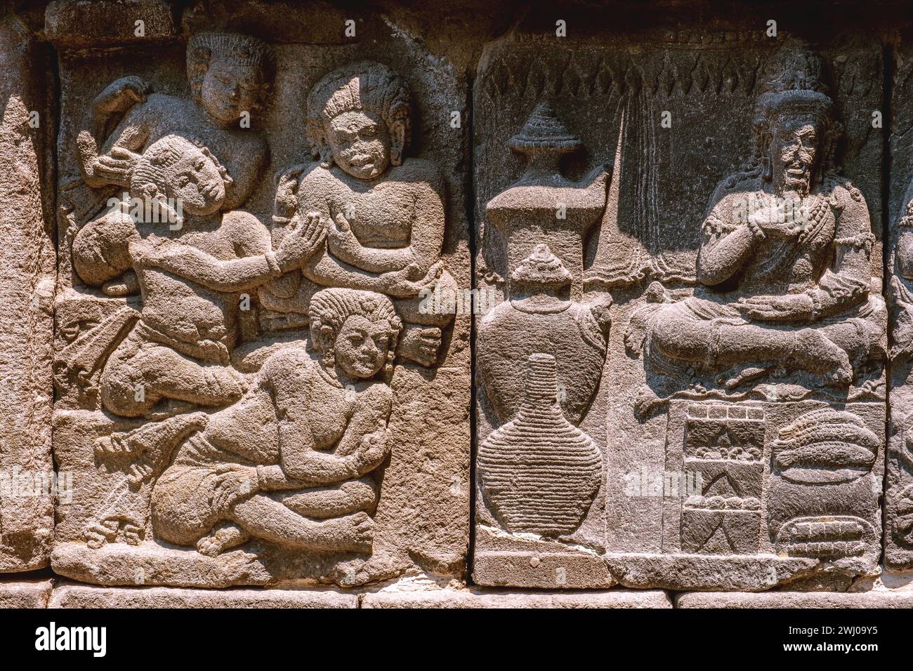 Stone carvings on the ancient walls of Borobudur temple in Indonesia ...