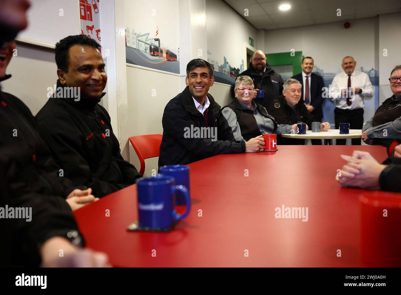 Prime Minister Rishi Sunak meets with bus drivers during his visit to a ...