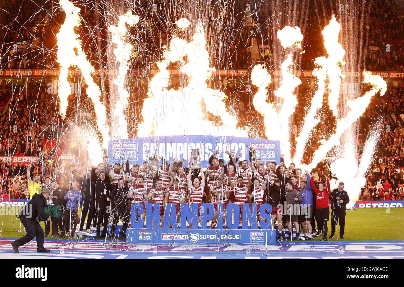 File photo dated 14-10-2023 of Wigan Warriors lift the trophy after ...