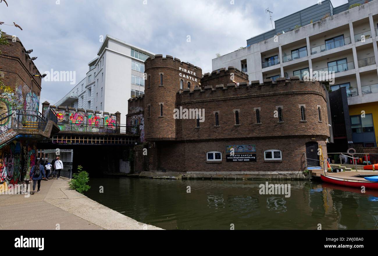London - 29 05 2022: Oval Rd Bridge and the Pirate Castle along the ...
