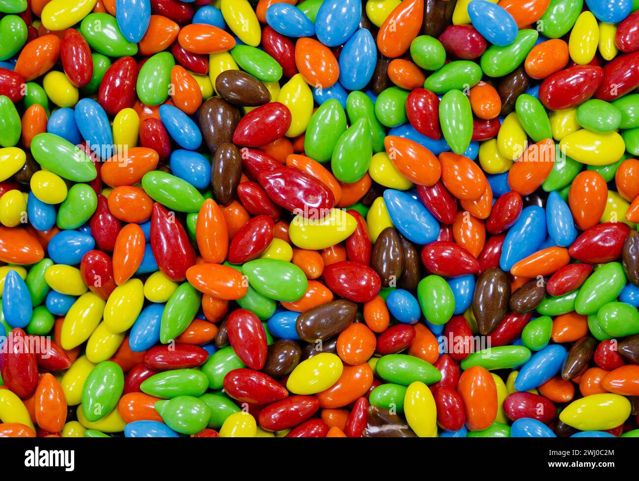 Assorted multicolor glazed sweet dragees, with nuts, seeds or chocolate ...